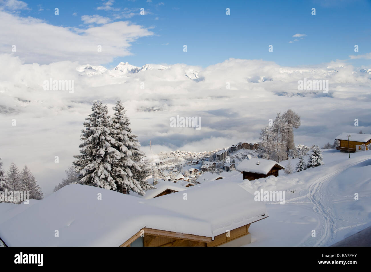 Winter scene of snow covered ski chalets in an Alpine ski resort Stock ...