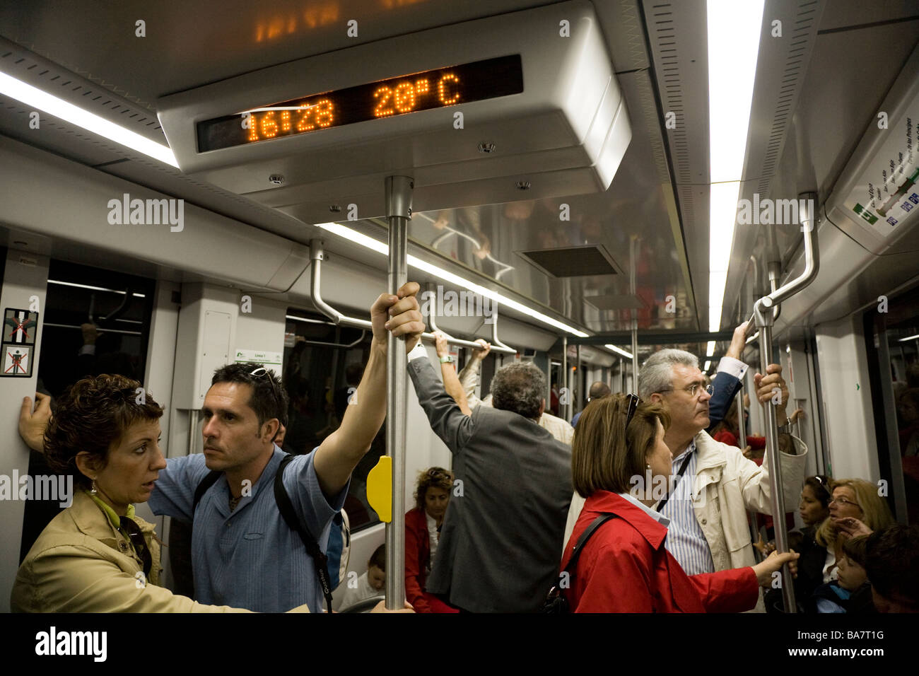 Inside a metro tube train compartment on the Seville metro underground ...