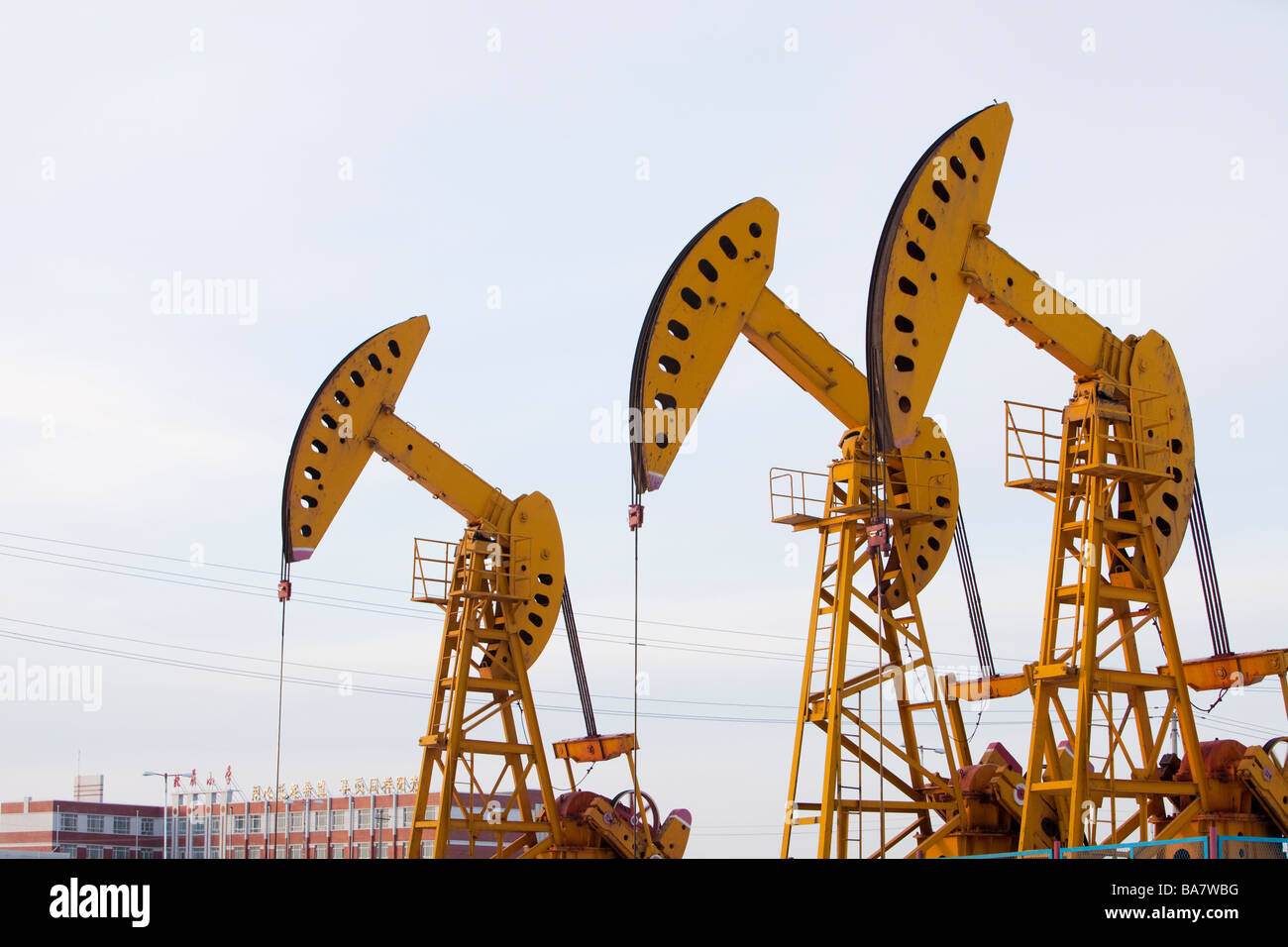 Nodding donkey oil pumps in the Daqing oil field in northern China ...