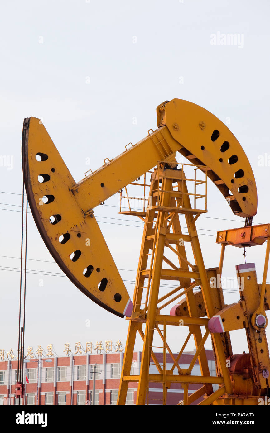 Nodding donkey oil pumps in the Daqing oil field in northern China ...