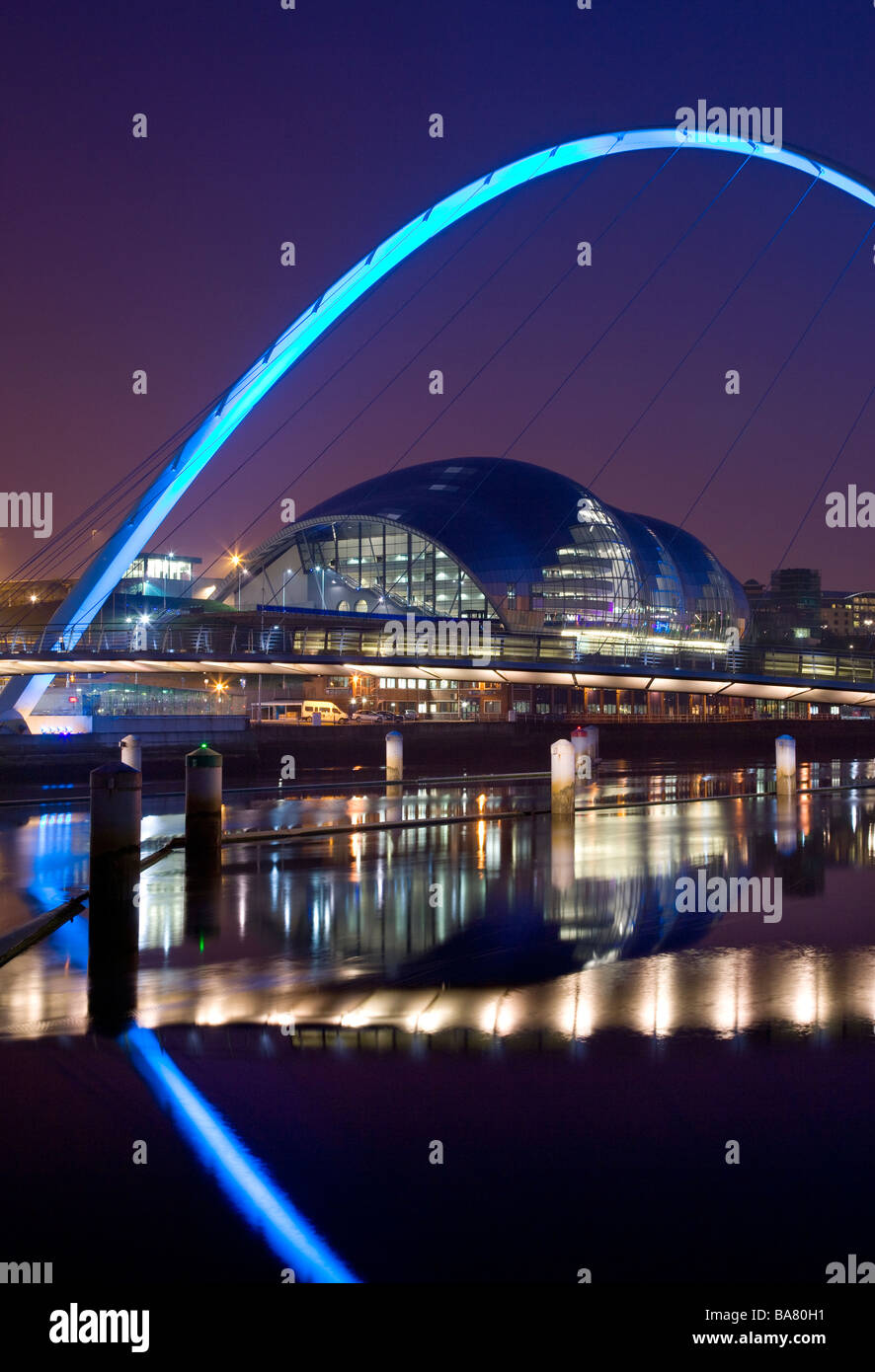 View down the Tyne river with bridges and The Sage Gateshead at night ...