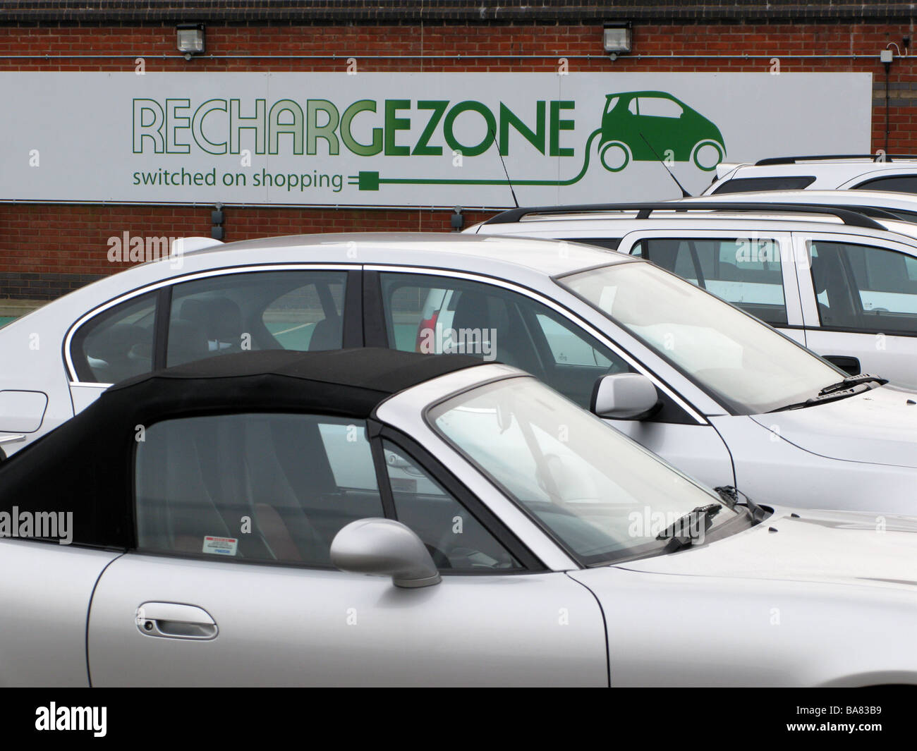 Electric Car recharging area Stock Photo - Alamy