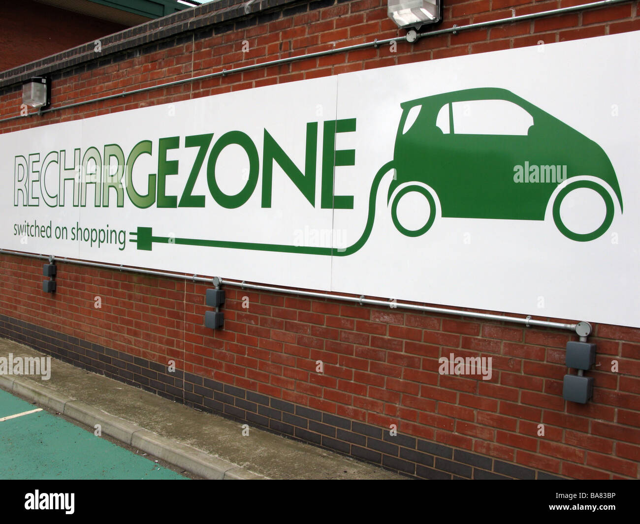 Electric car recharging area Stock Photo - Alamy