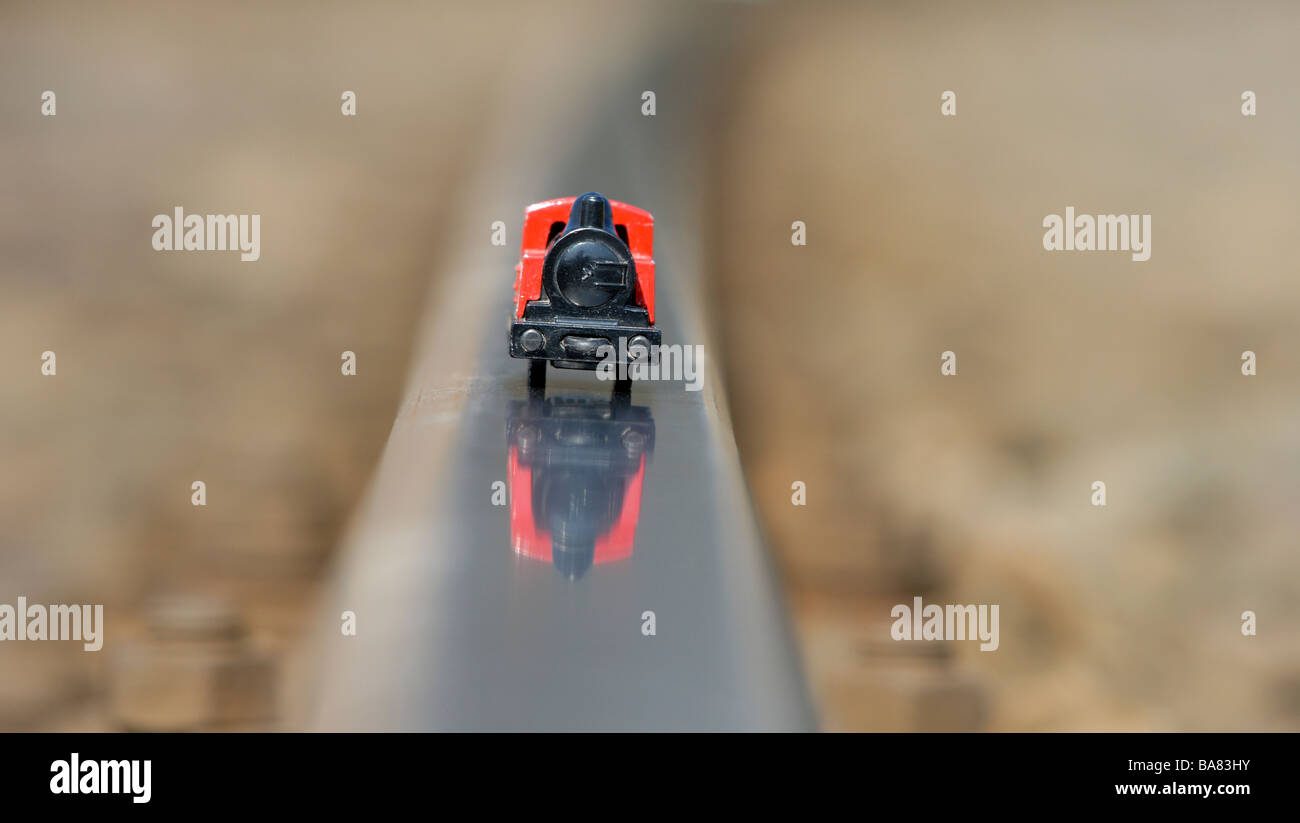 Steam locomotive engine, train model railway on real track outside ...