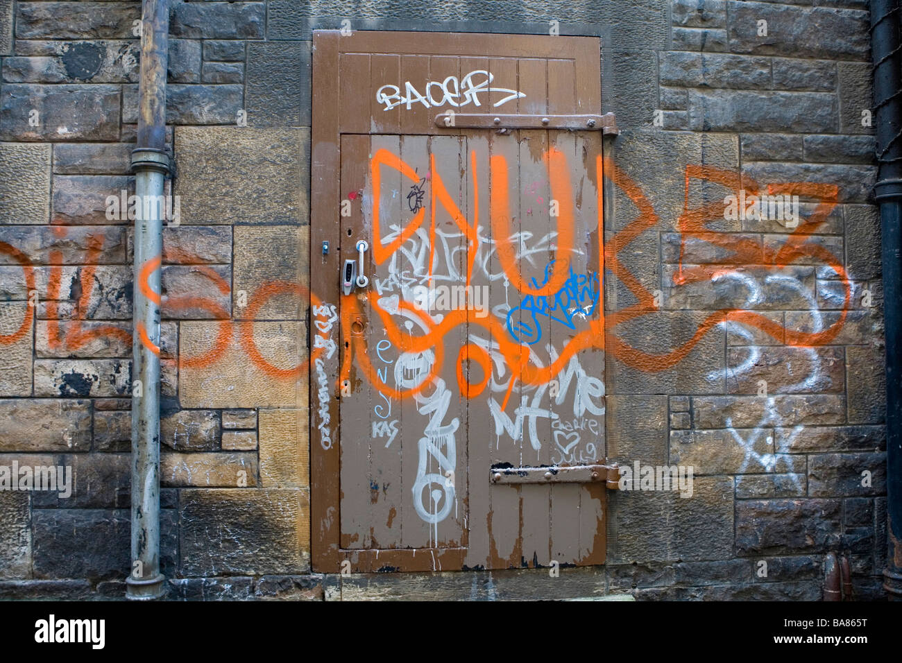 Graffiti in a close or alley in Old Town, Edinburgh, Scotland ...