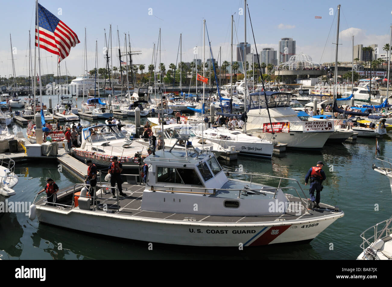 The coast guard patrols the docks of Rainbow Harbor Stock Photo - Alamy