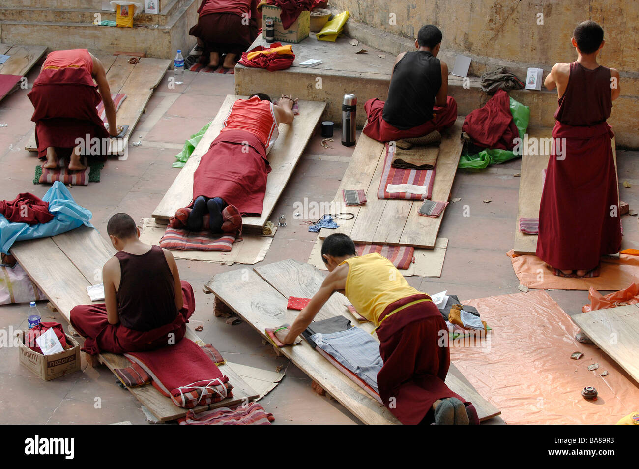 India : monks bowing down Stock Photo - Alamy