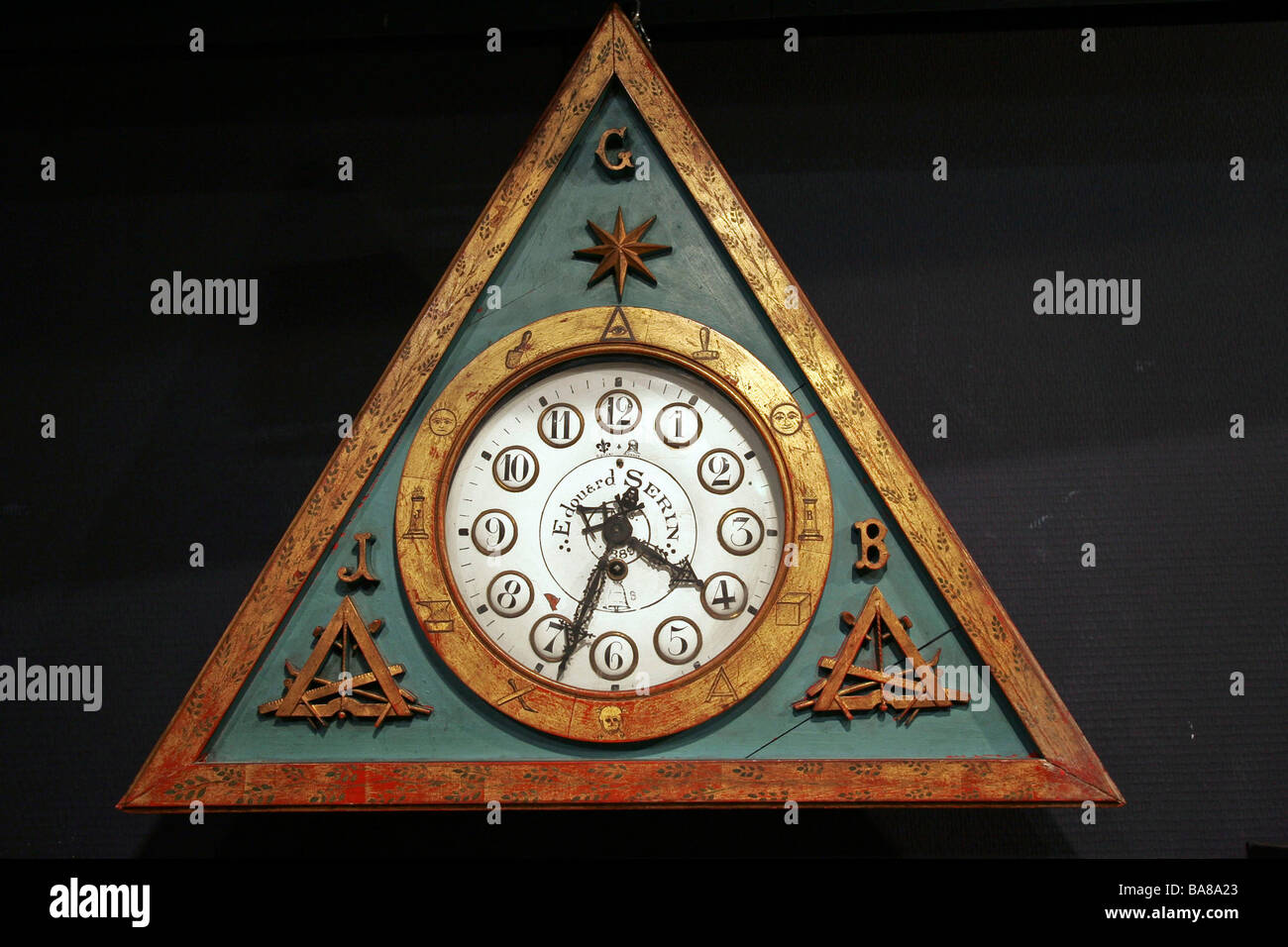 Freemason symbol: masonic wall clock Stock Photo - Alamy