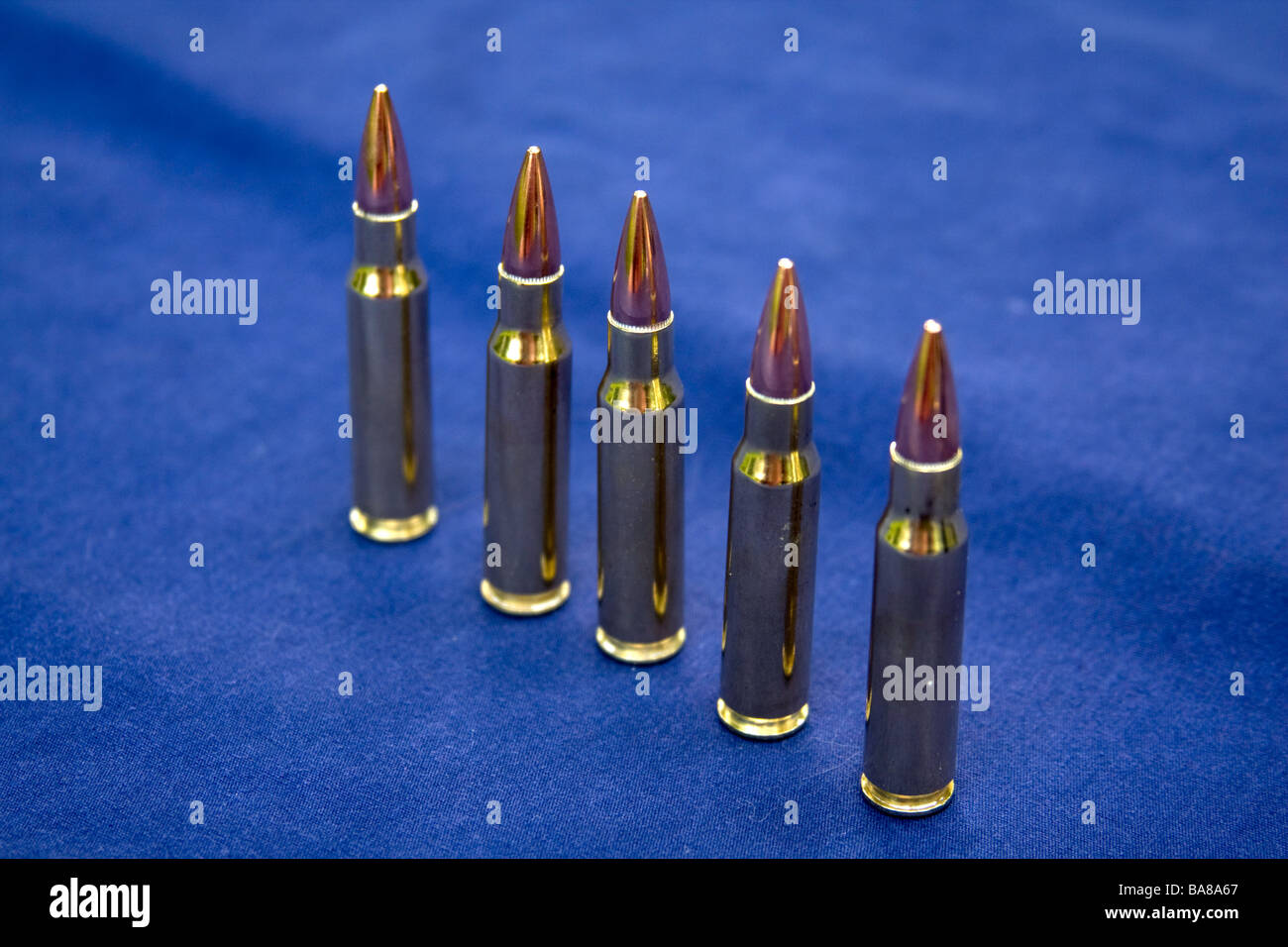 Rifle bullets stand in military formation prepared to carry out the ...