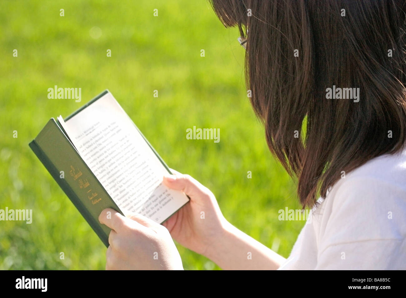 Reading a book Stock Photo - Alamy