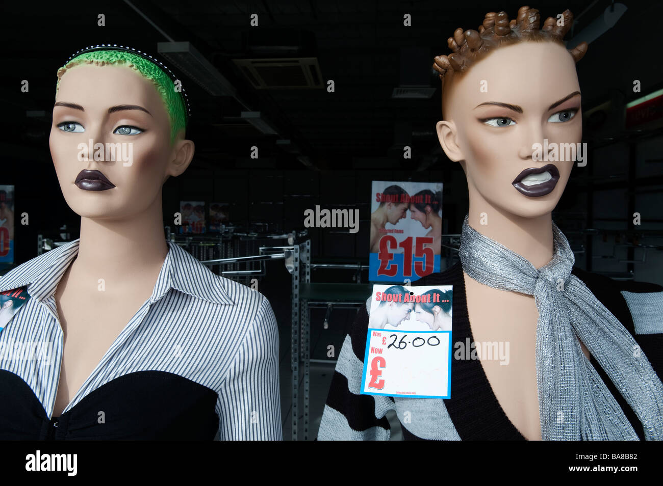 Mannequins in an empty shop Stock Photo - Alamy