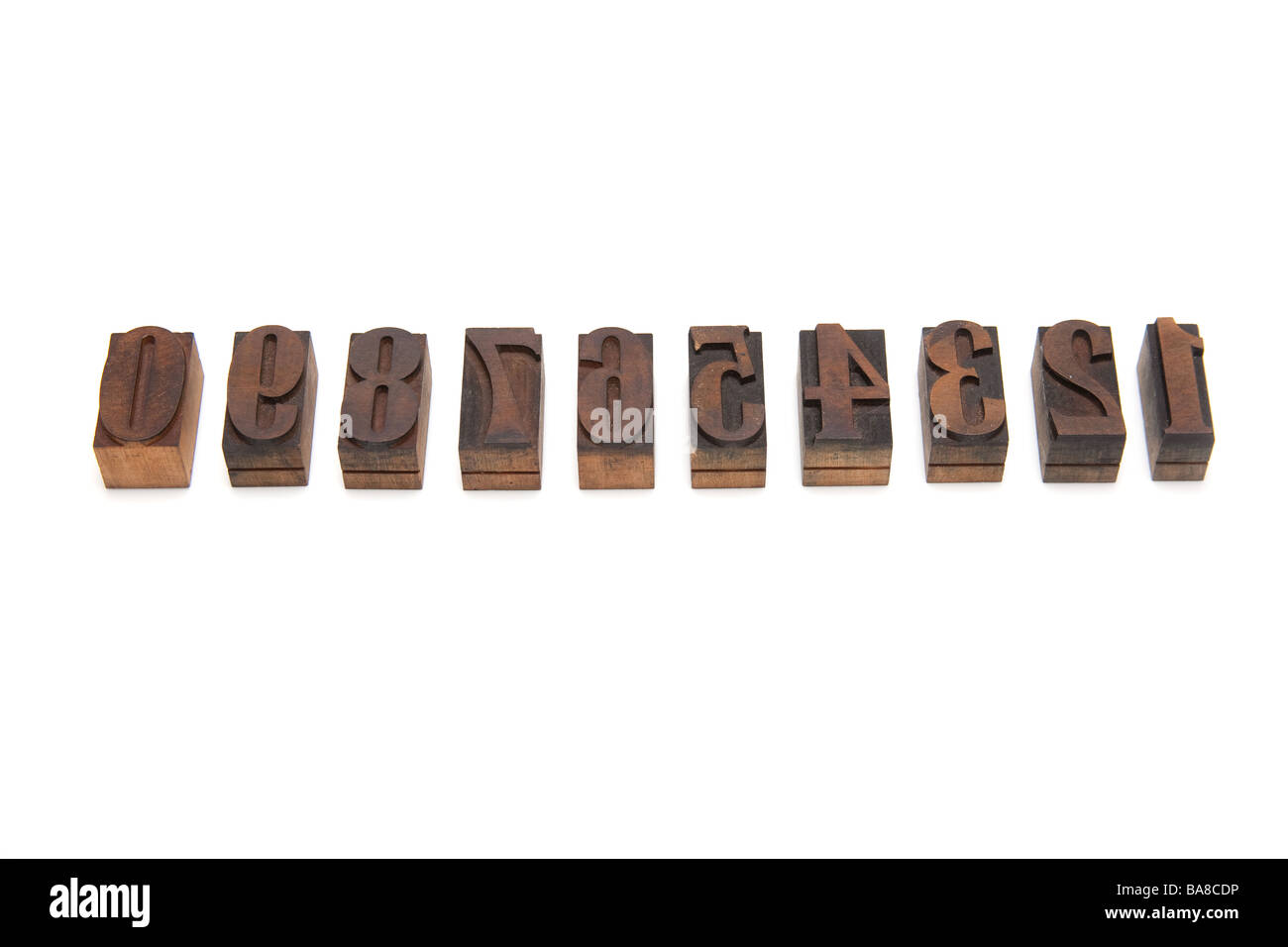 Wooden letterpress printing blocks isolated on a white studio ...