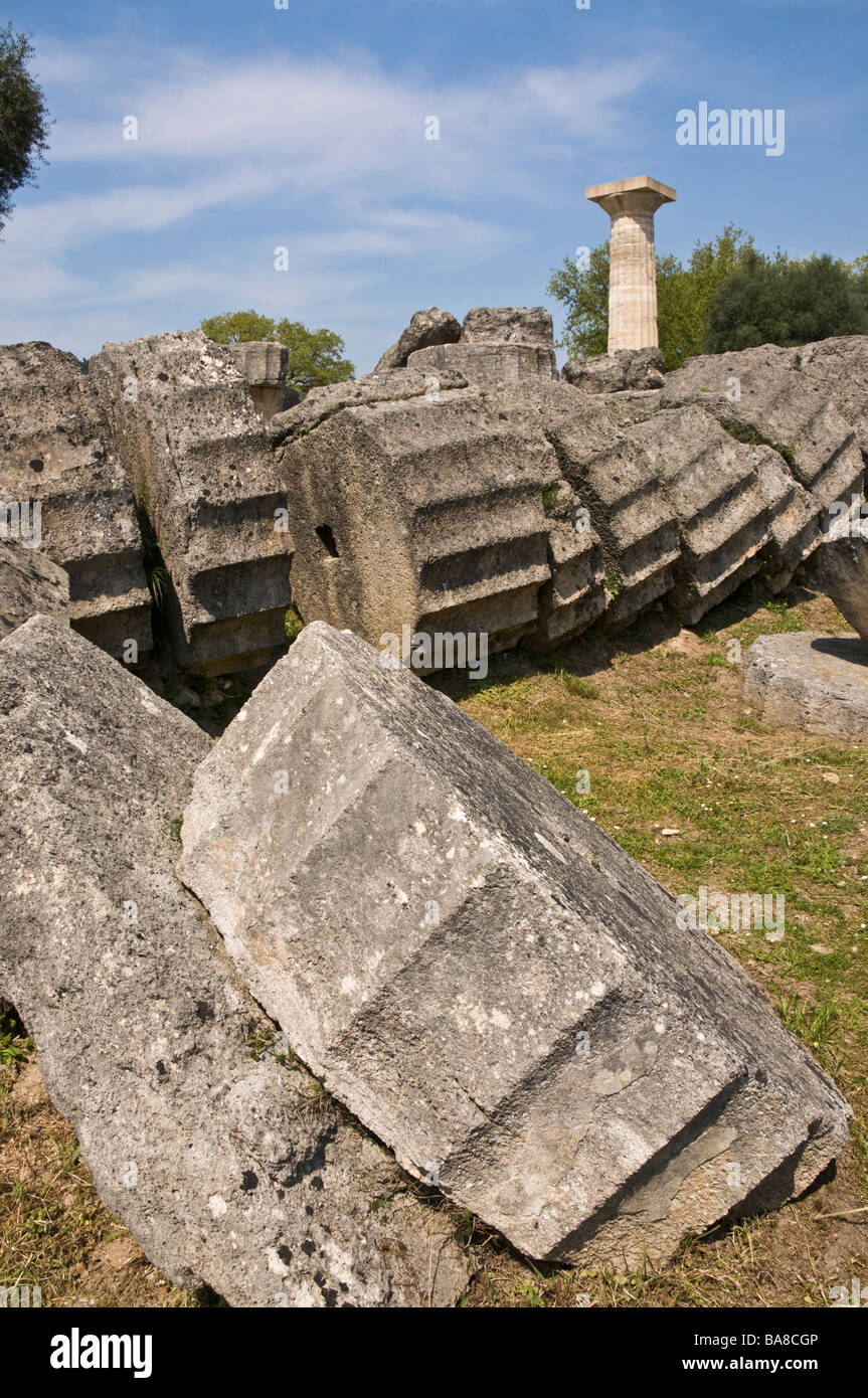 A re erected doric column towers over similar fallen column drums at ...