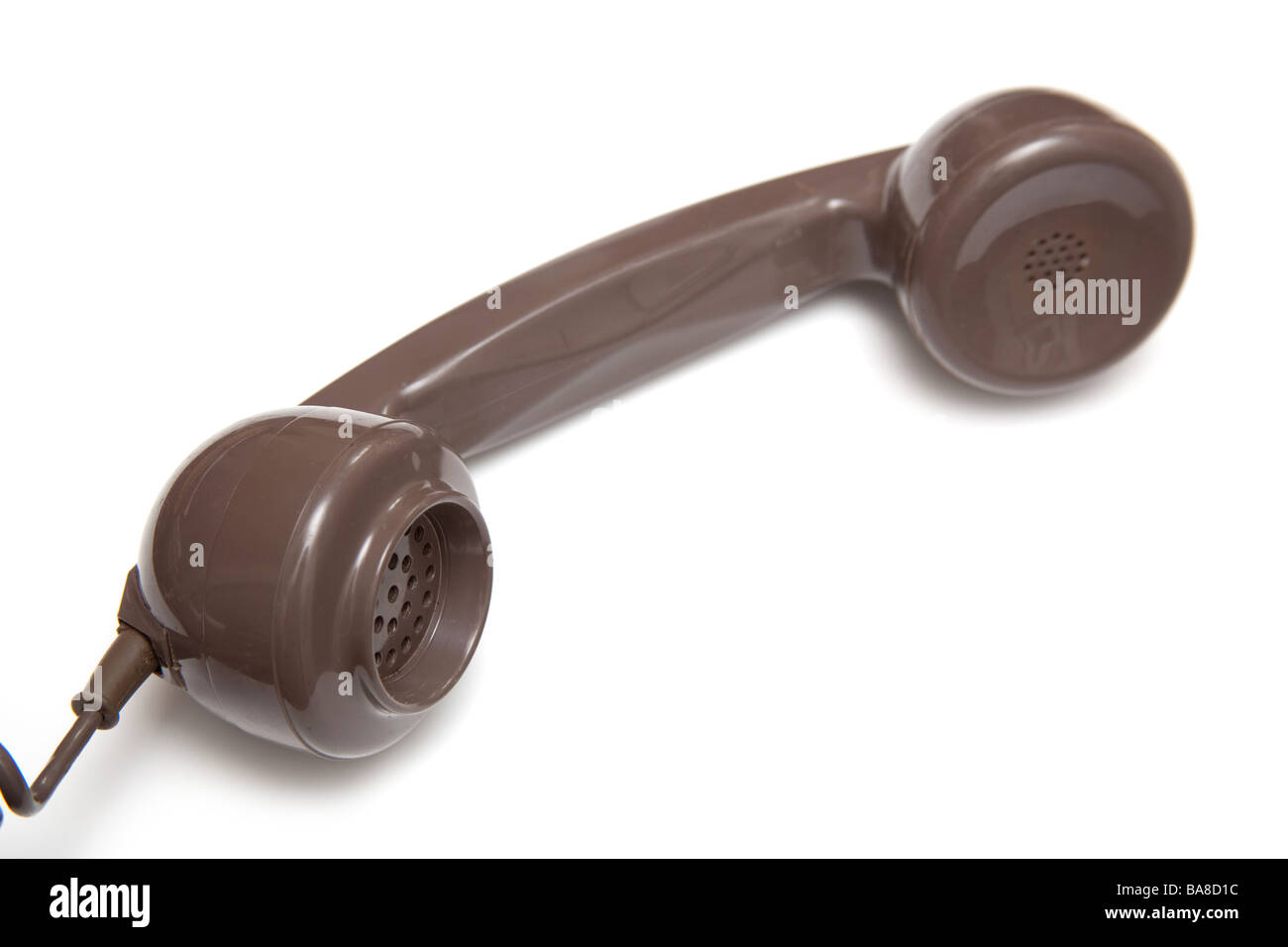 Traditional GPO telephone receiver isolated on a white studio ...