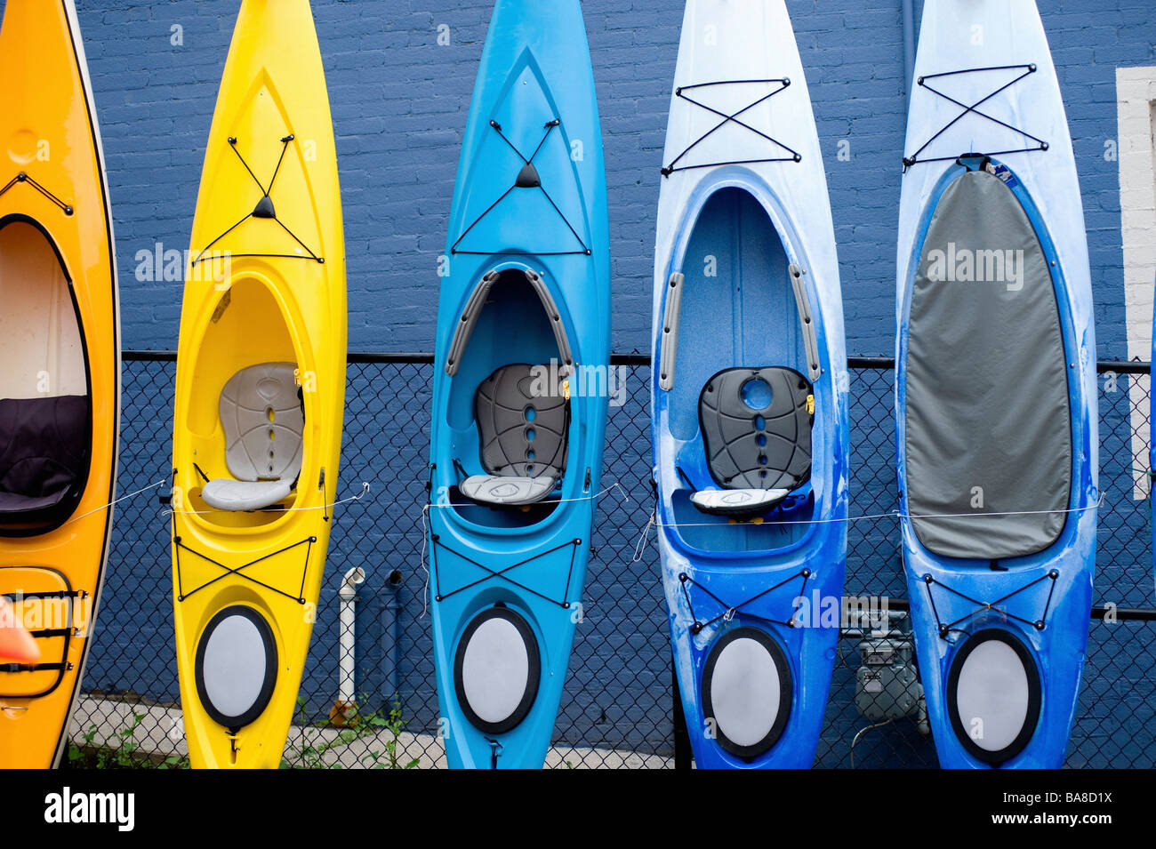 Bracebridge, Muskokas, Ontario, Canada; Kayaks stacked up against a ...