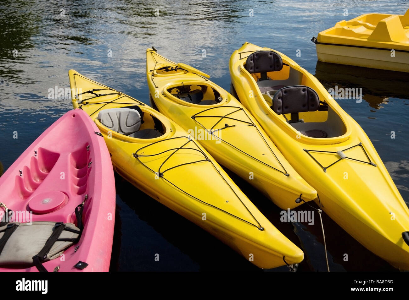 Muskokas, Ontario, Canada; Empty kayaks in water Stock Photo - Alamy