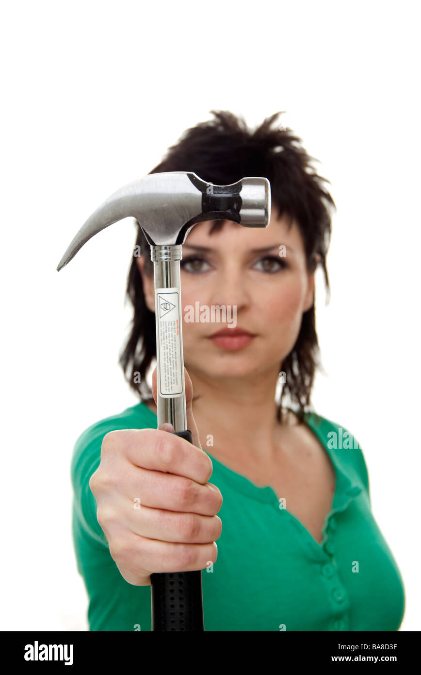 Female builder using claw hammer hi-res stock photography and images ...
