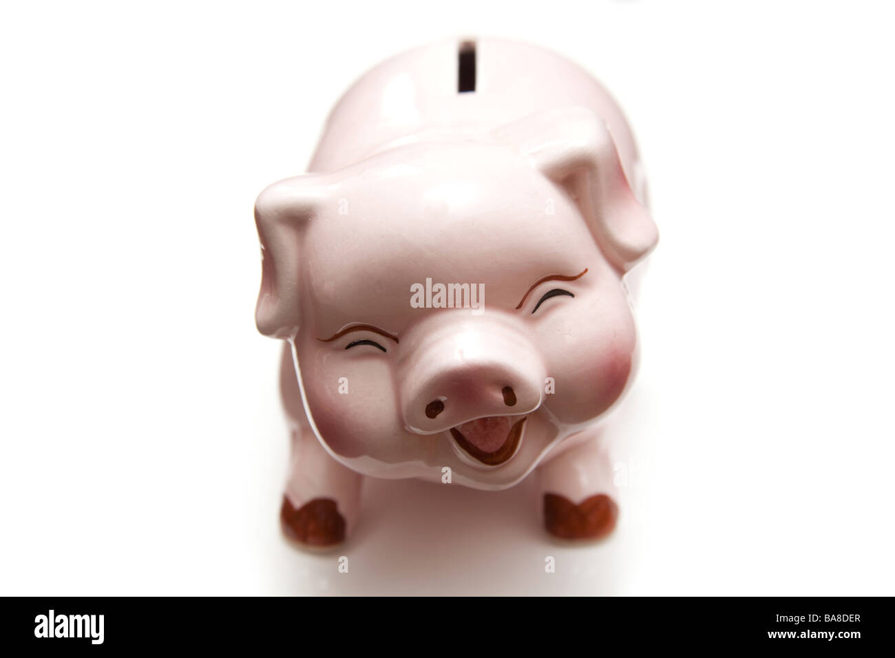 Piggy bank style money box isolated on a white studio background Stock ...