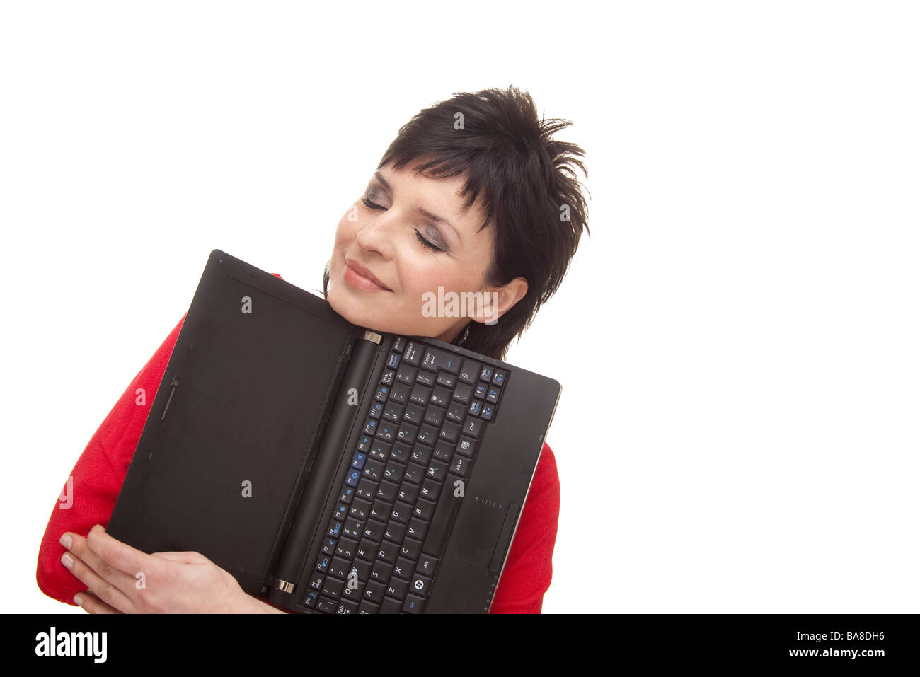 woman hugging her laptop computer Stock Photo - Alamy