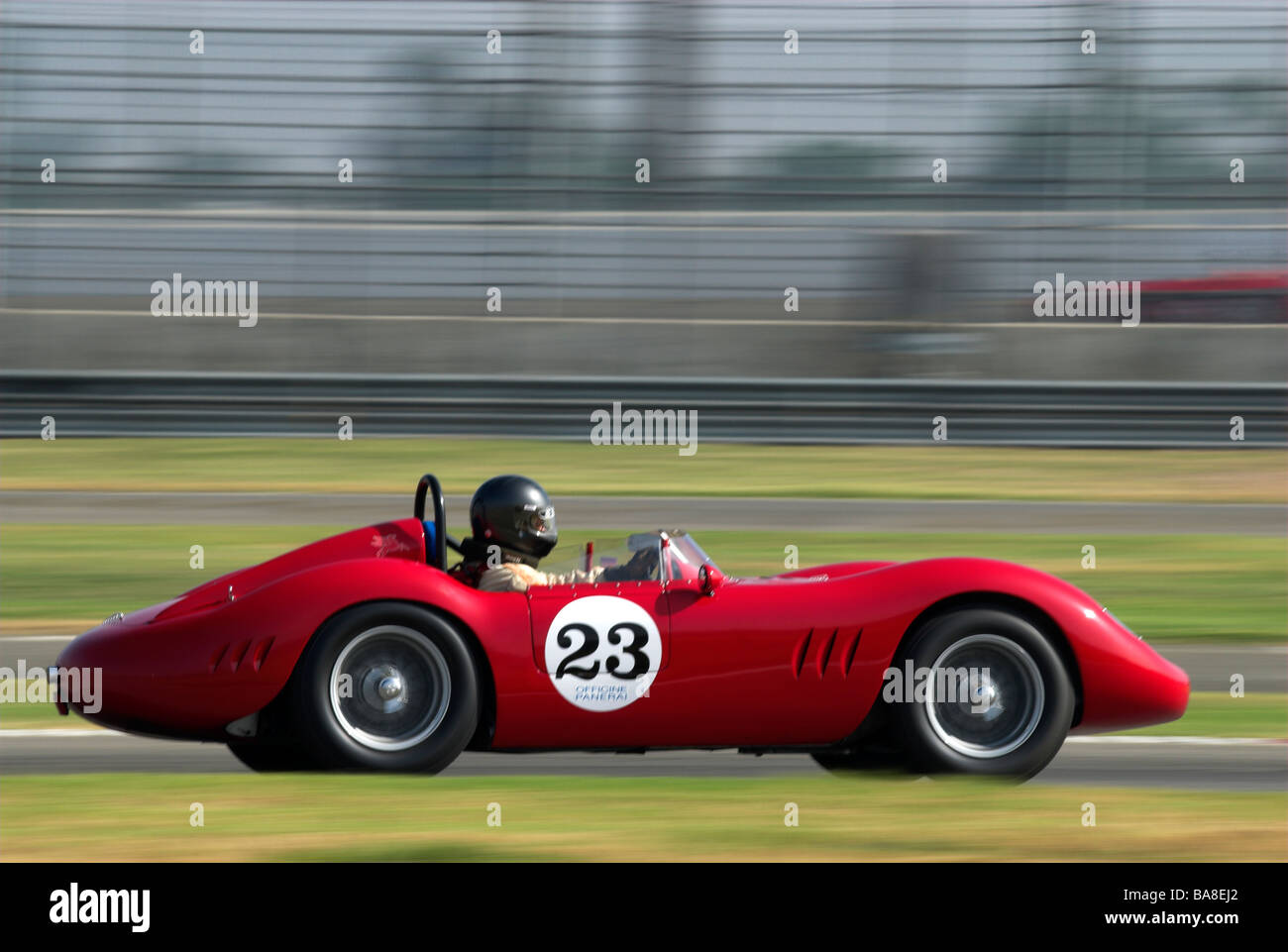 A 1955 Maserati 200SI competes at a Shell Historics Challenge event ...