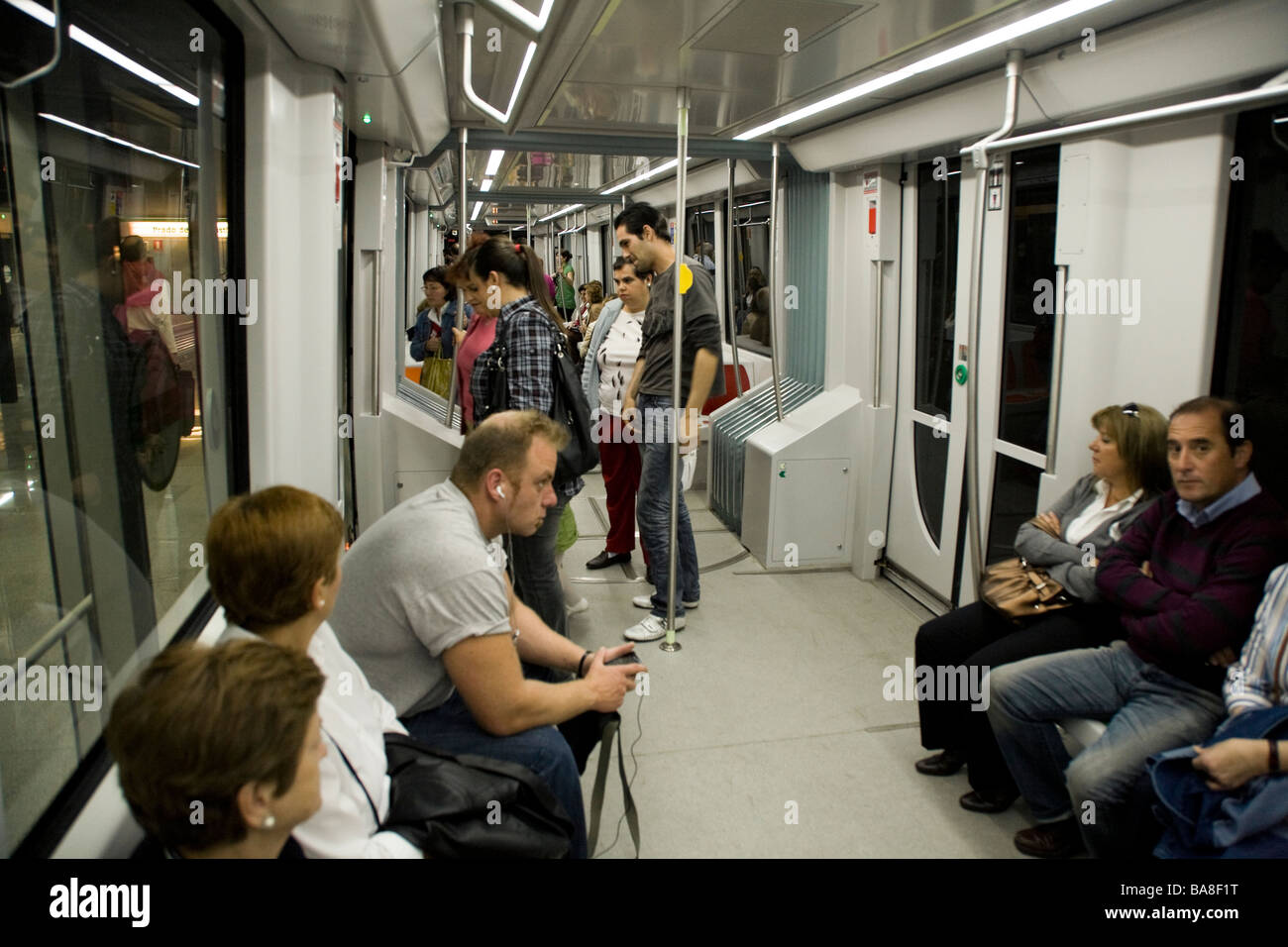 Inside a metro tube train compartment on the Seville metro underground ...