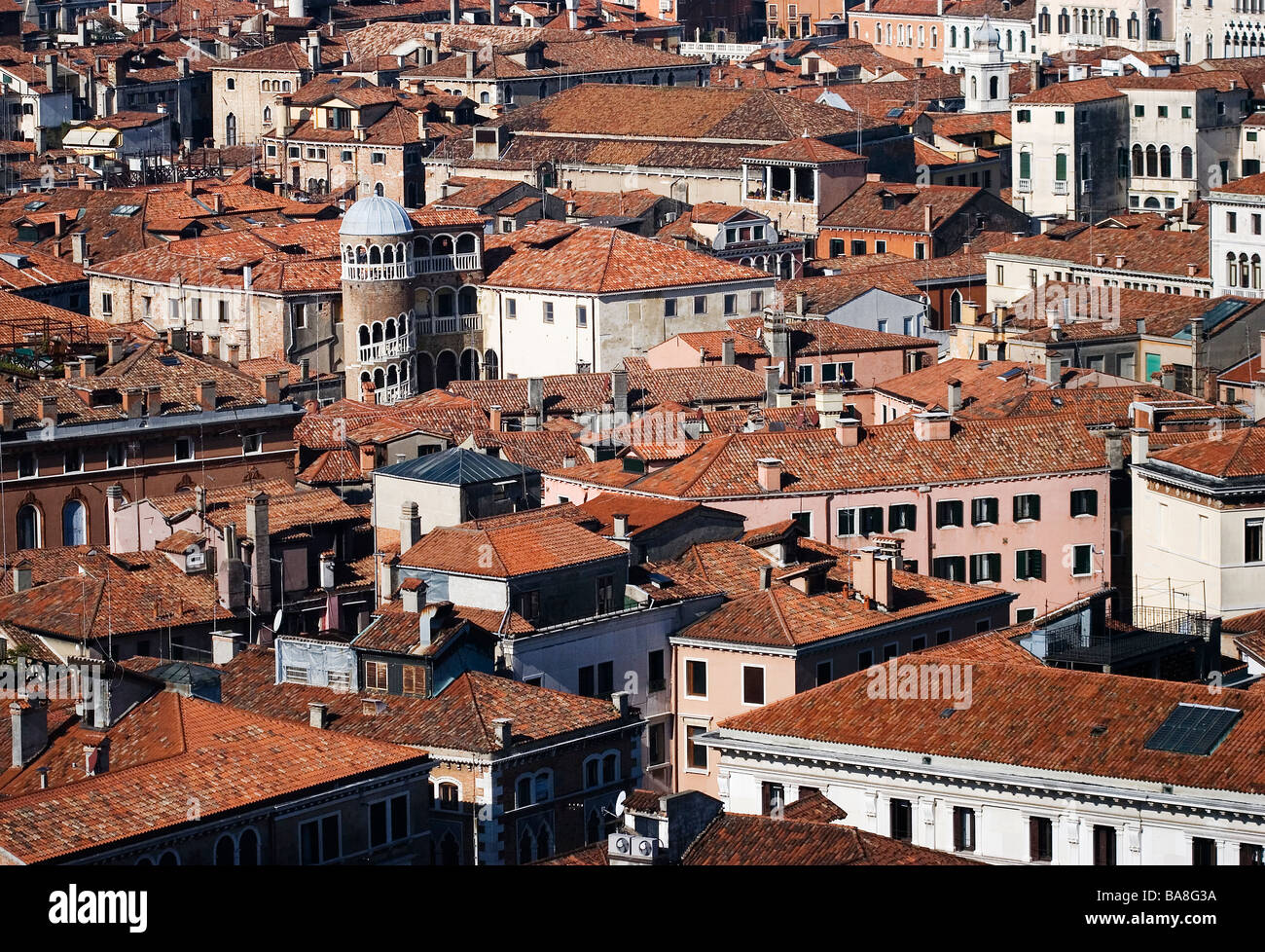 View of Venetian rooftops and the spiral staircase of Palazzo Contarini ...