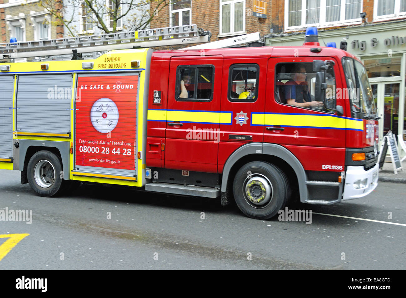 Fire engine Upper Street Islington London England UK Stock Photo - Alamy