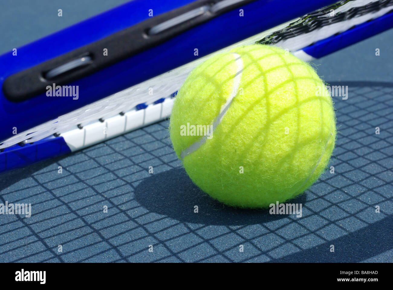Tennis ball and racquet Stock Photo - Alamy