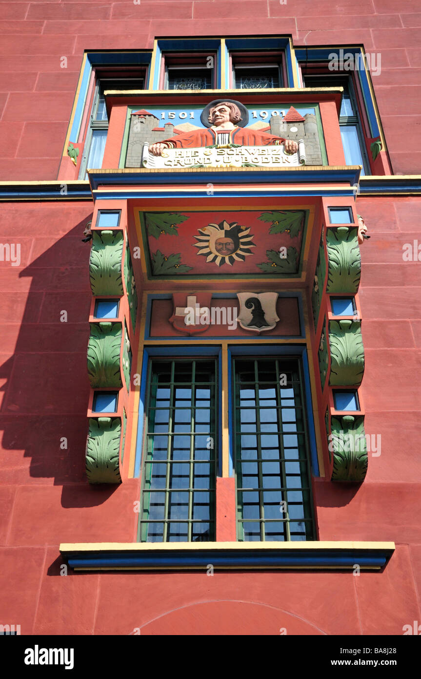 Part of the tower Basel town hall rathaus containing symbols of the ...