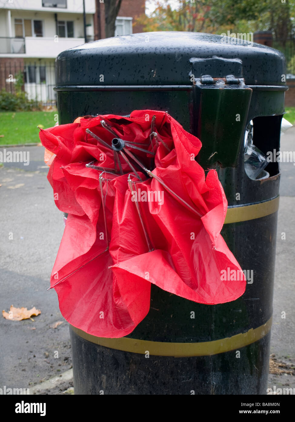 Old Discarded Broken Umbrella in Trash Bin Can in Fall Autumn Stock ...