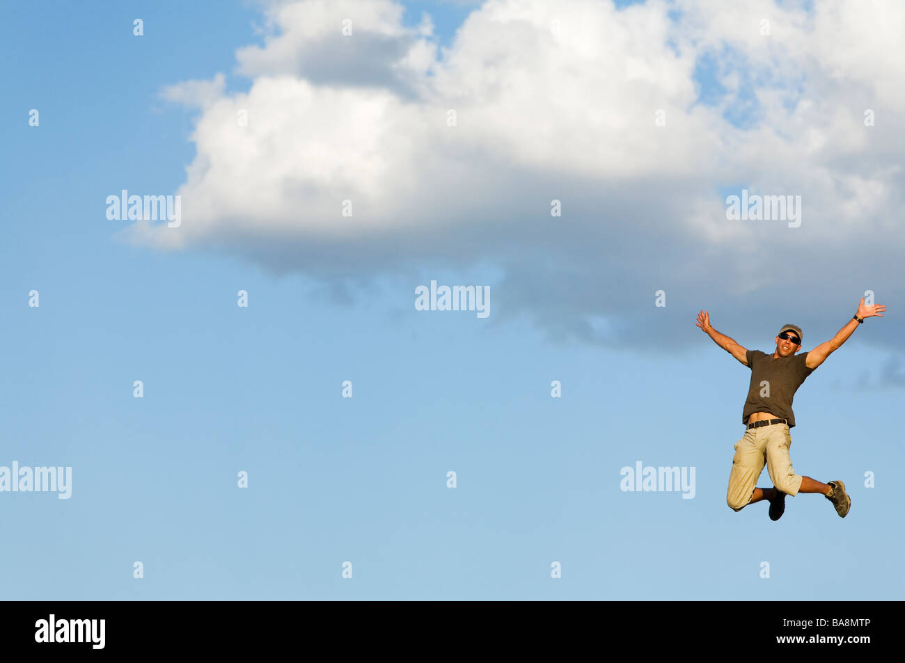 Jumping for joy Stock Photo - Alamy