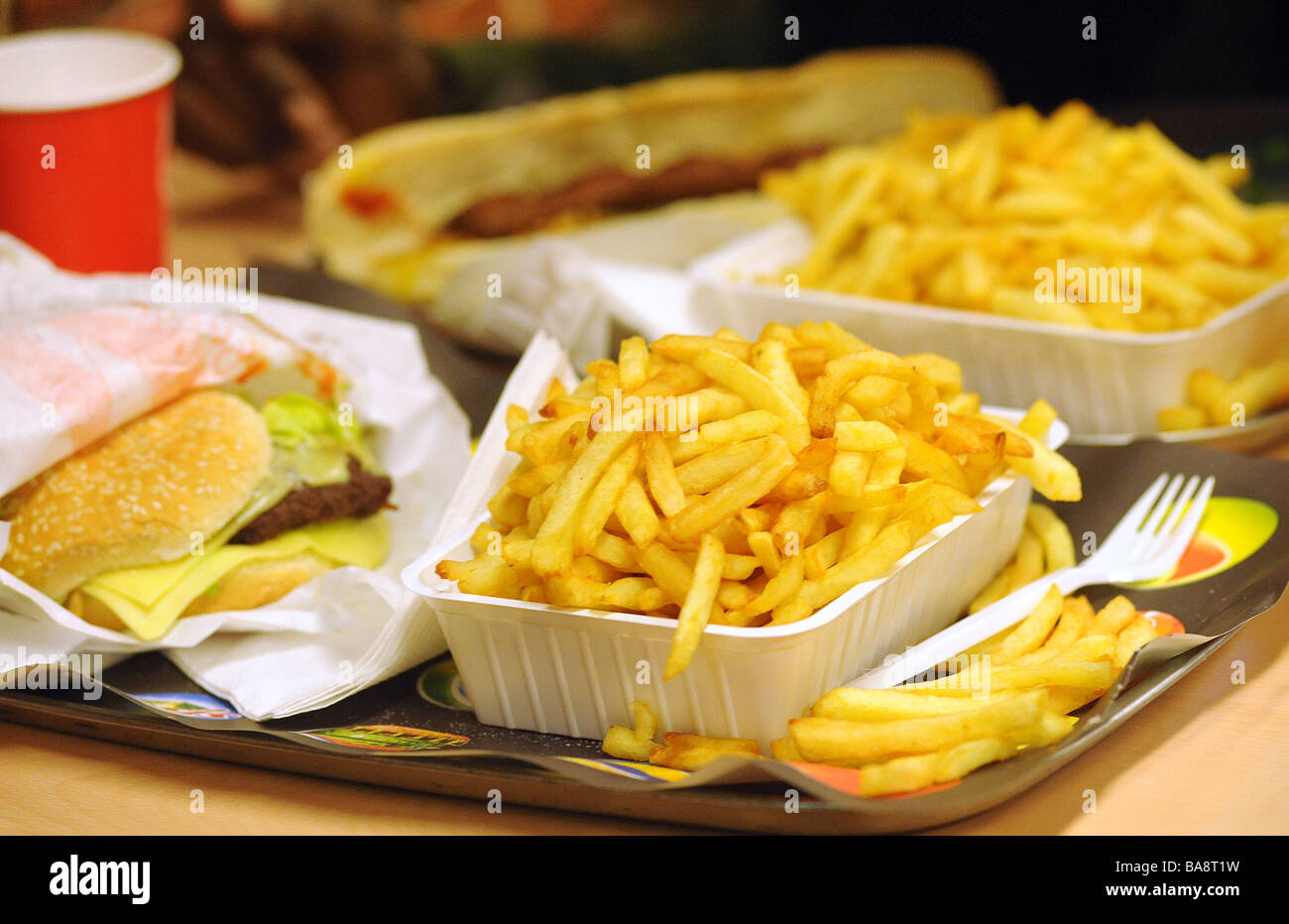 Chips / fries on sale: chip shop Stock Photo - Alamy