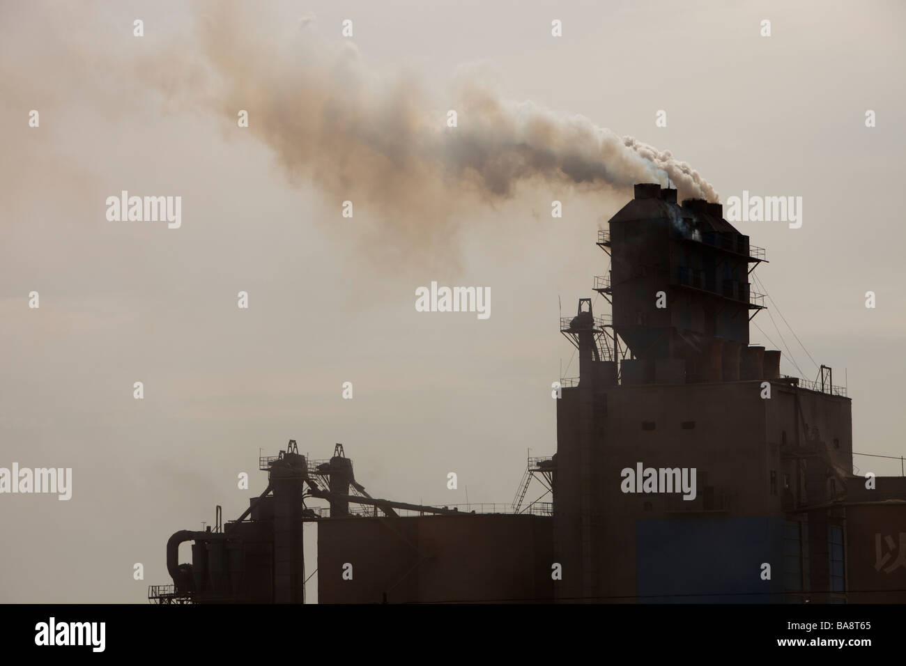 Emissions from a cement factory in Inner Mongolia, China Stock Photo ...