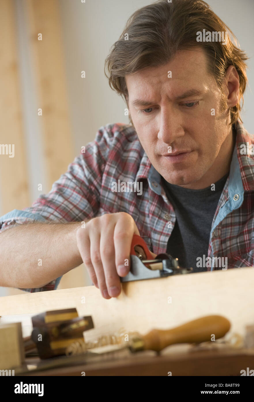 Man using woodworking tools Stock Photo - Alamy
