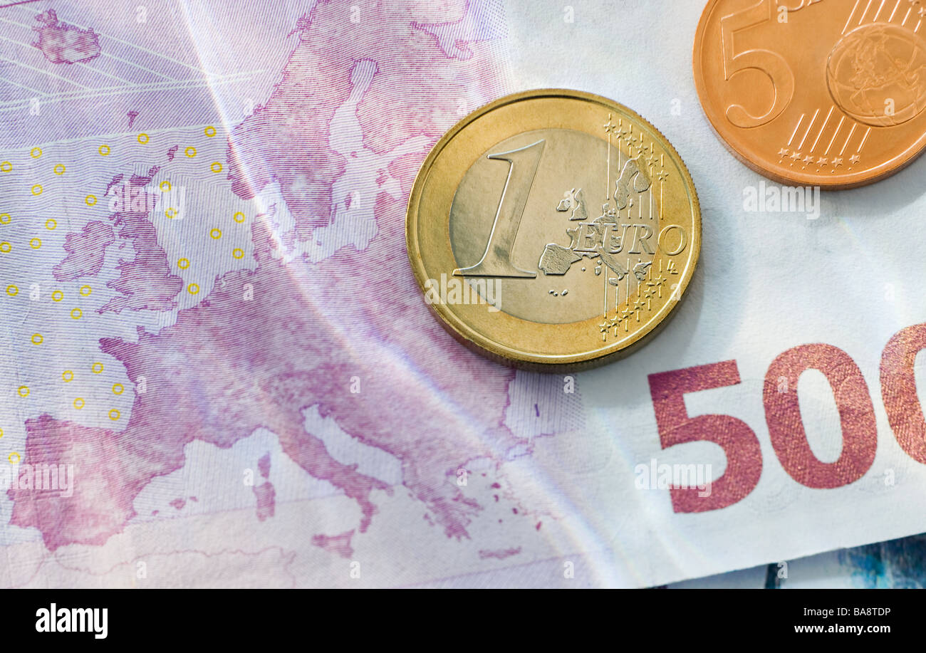 Euro coins and paper currency Stock Photo - Alamy