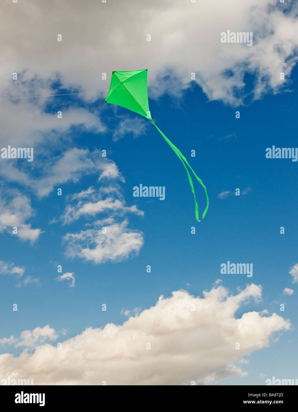 Green kite in sky Stock Photo - Alamy
