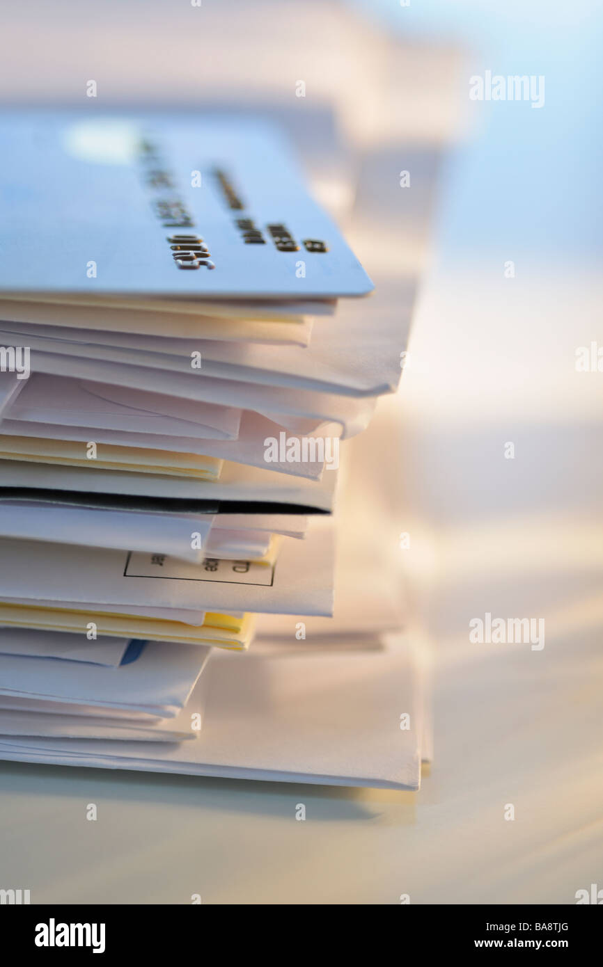 Credit card on stack of mail Stock Photo - Alamy