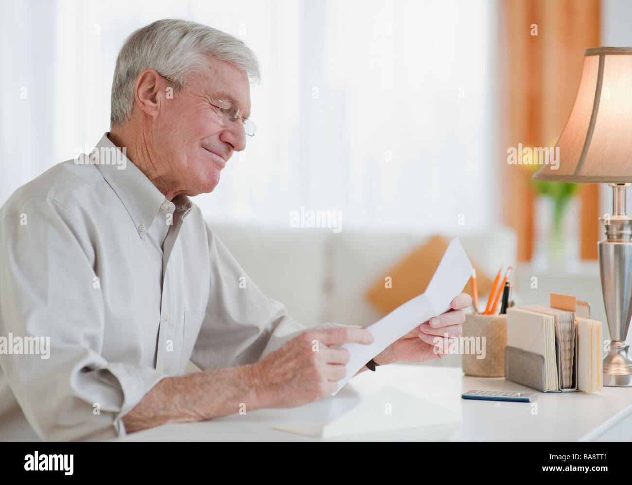 Person reading letter hi-res stock photography and images - Alamy
