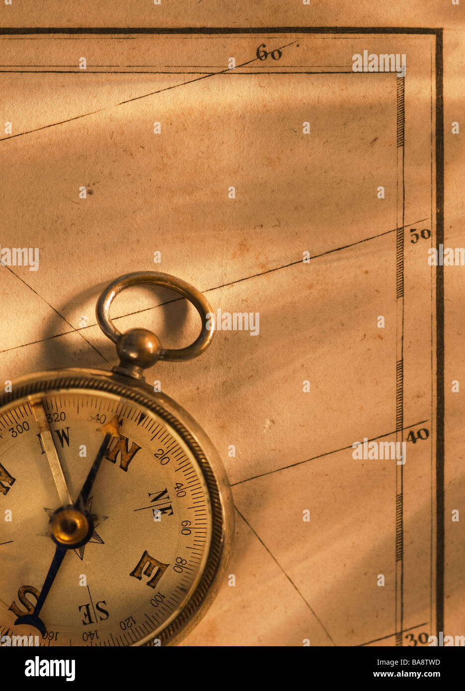 Close up of antique map and compass Stock Photo - Alamy