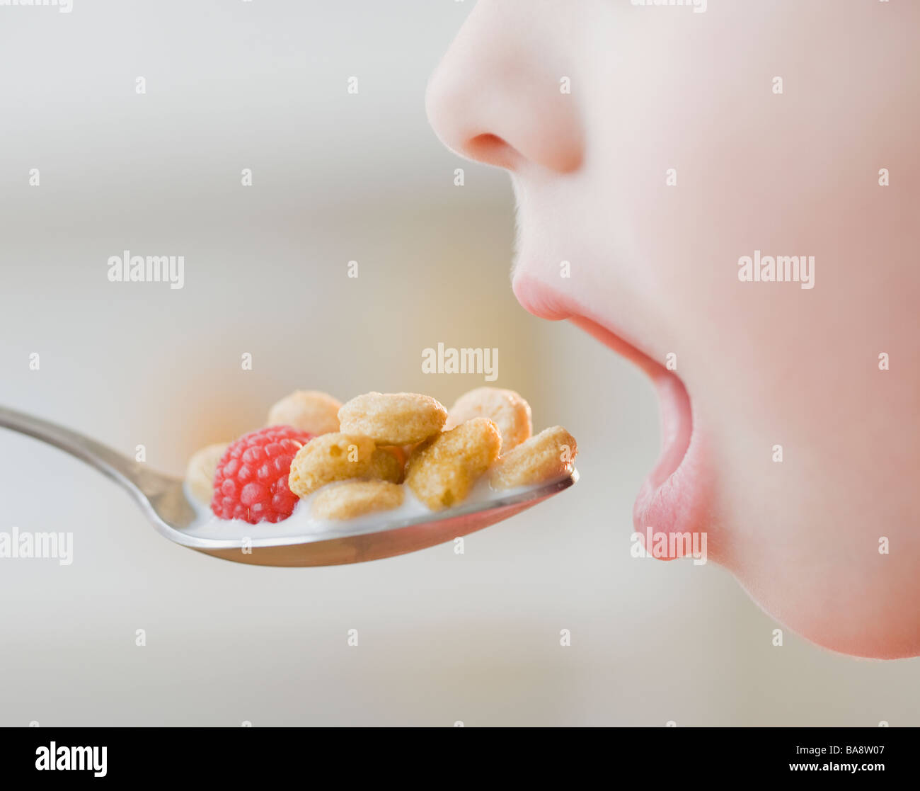 Boy eating cereal close up hi-res stock photography and images - Alamy