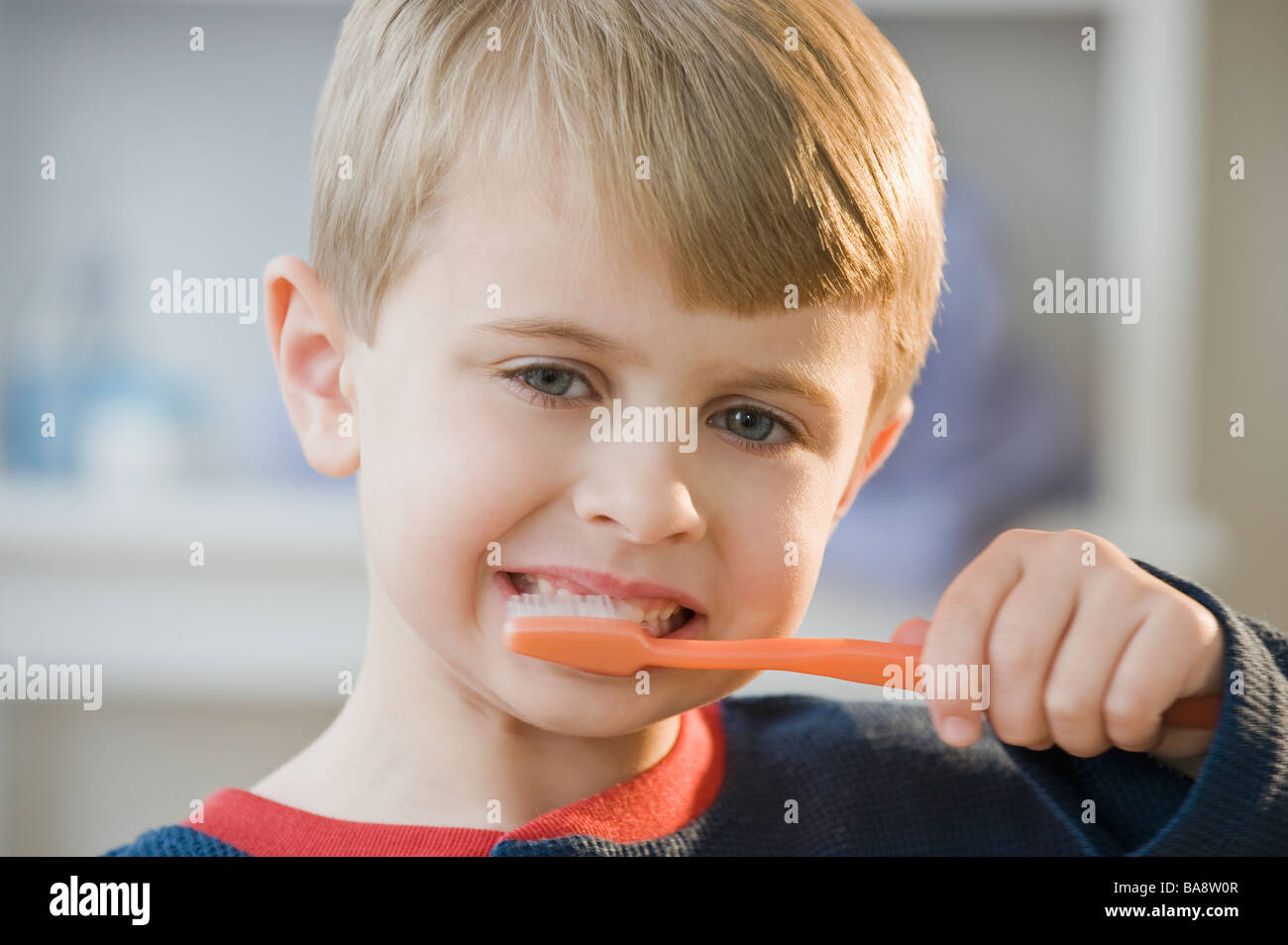 Boy brushing teeth Stock Photo - Alamy