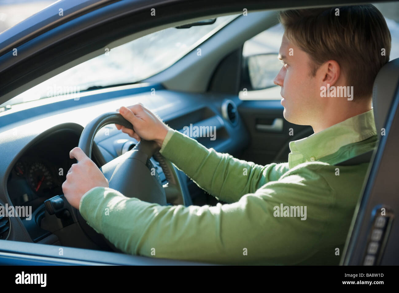 Man driving car Stock Photo - Alamy
