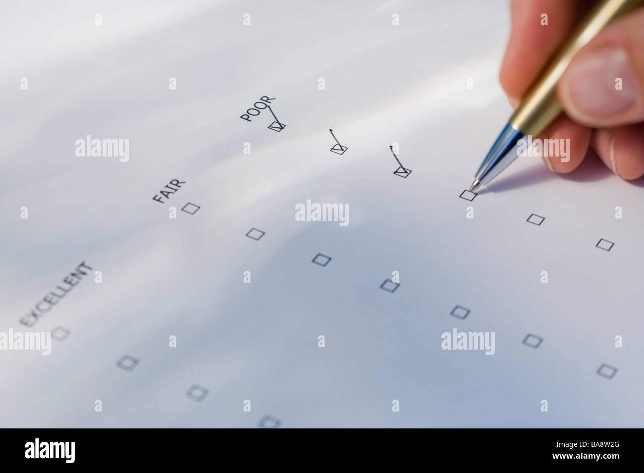 Man checking rating boxes Stock Photo - Alamy