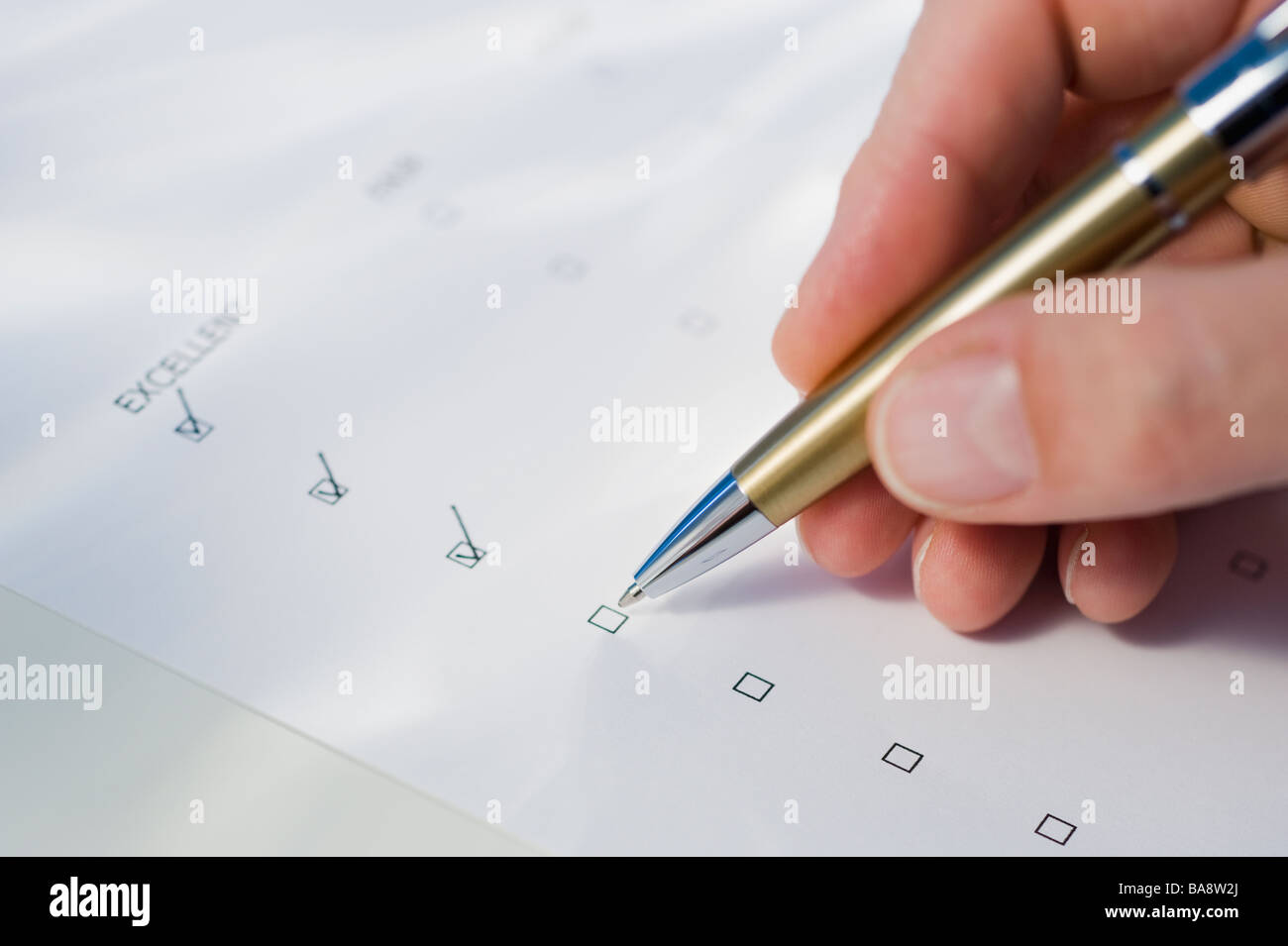 Man checking rating boxes Stock Photo - Alamy