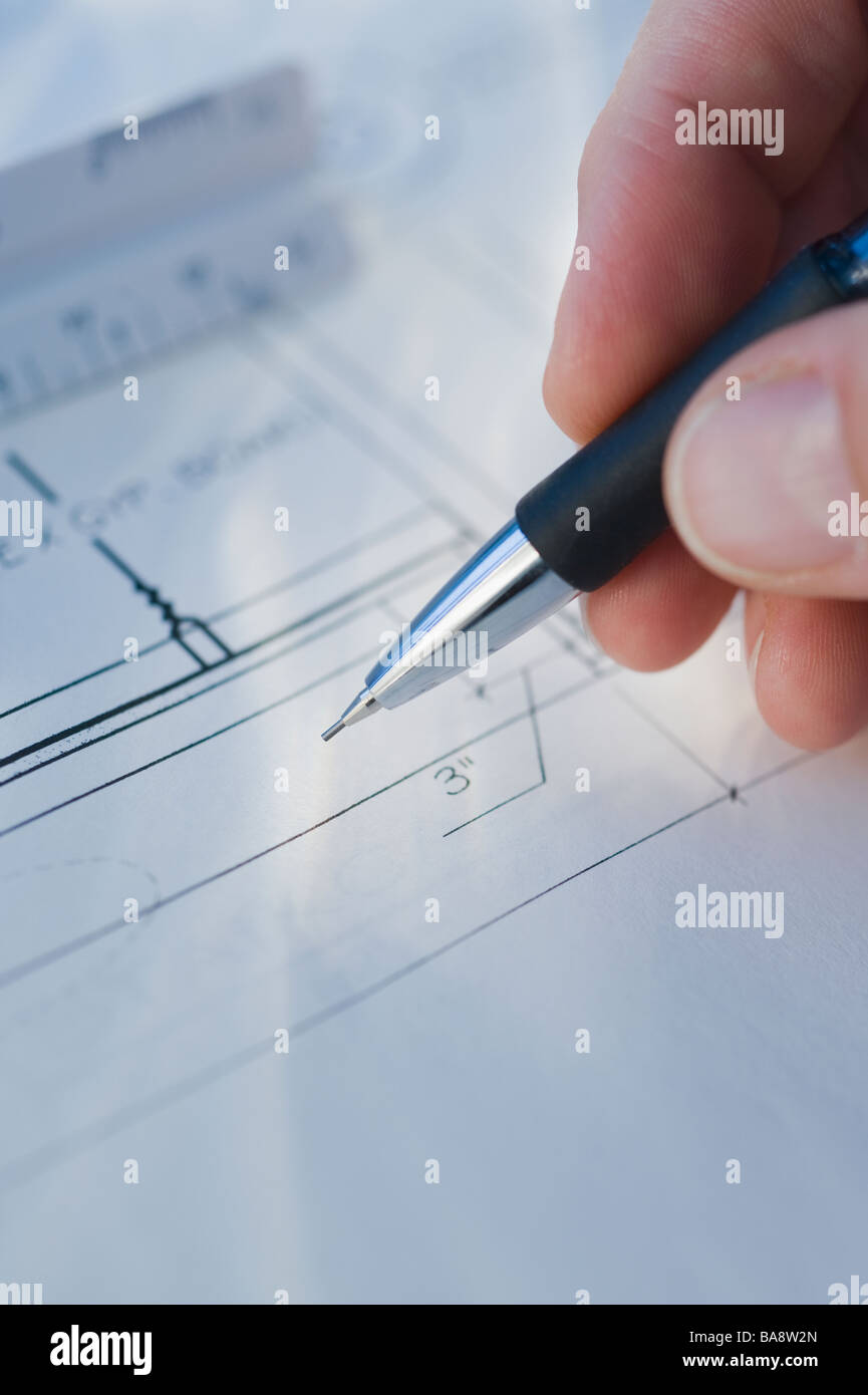 Man drawing blueprints Stock Photo - Alamy