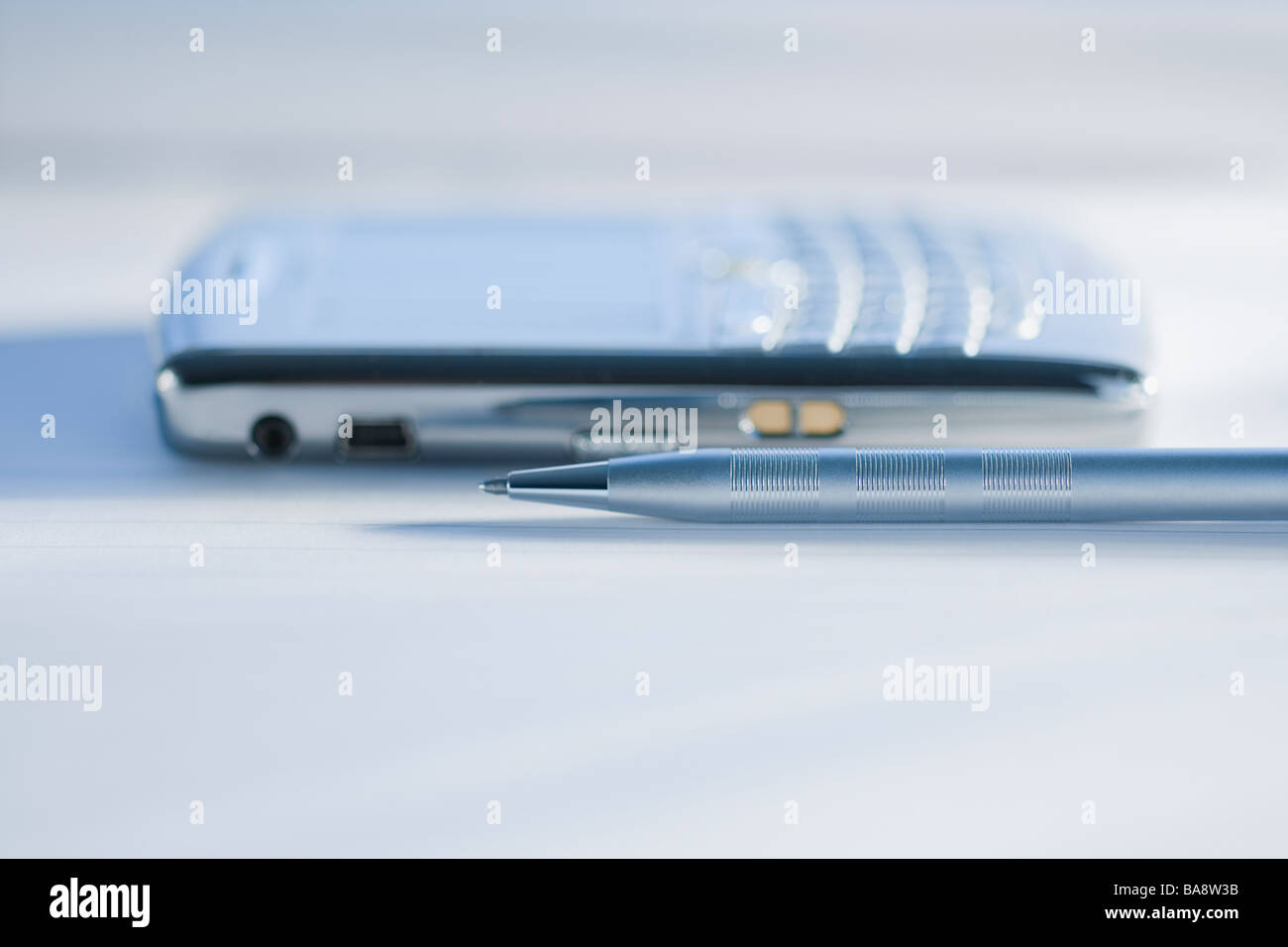 Close up of pen and electronic organizer Stock Photo - Alamy