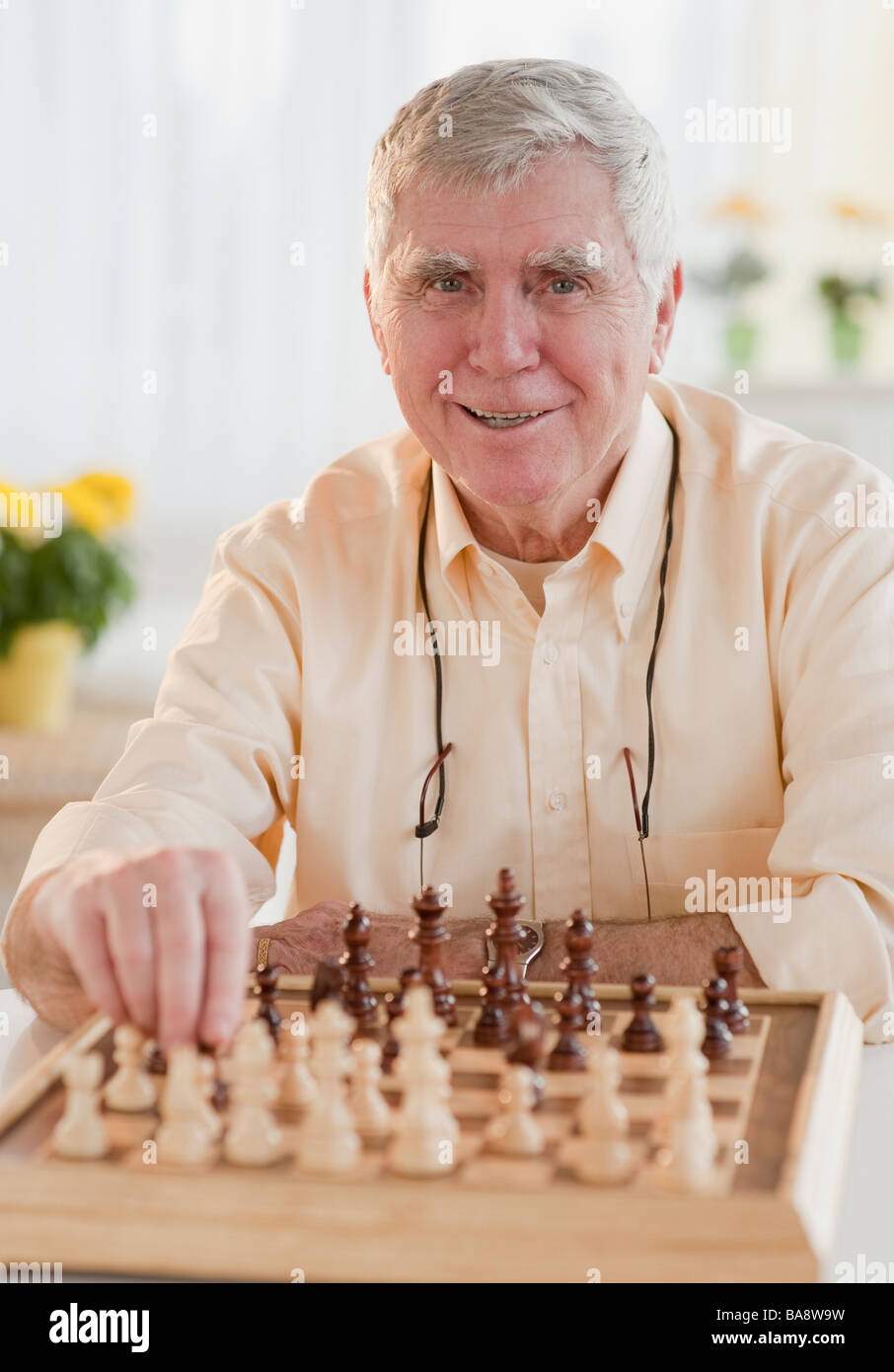 Senior man playing chess Stock Photo - Alamy