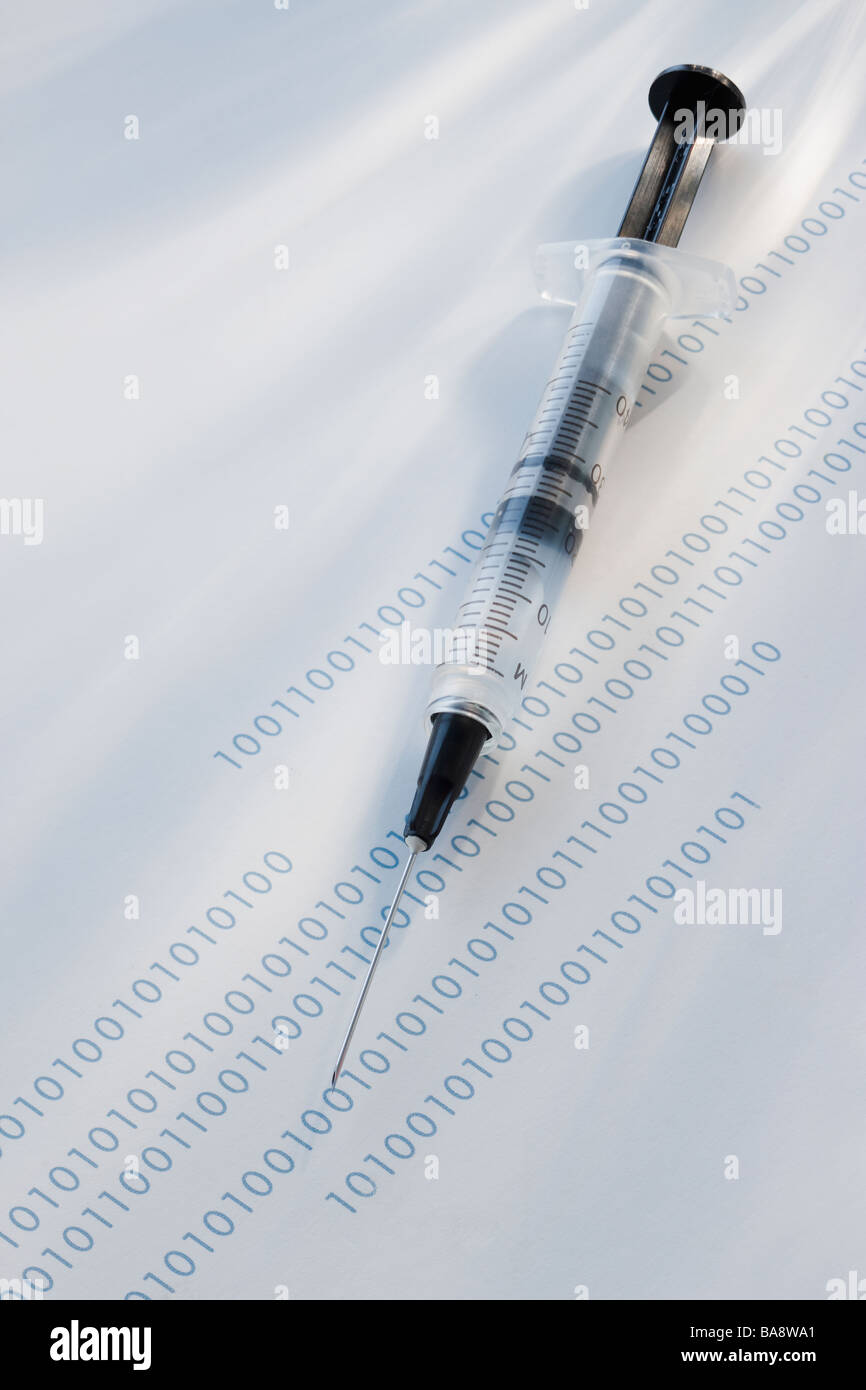 Syringe on binary code Stock Photo - Alamy Syringe on binary code Stock Photo - Alamy