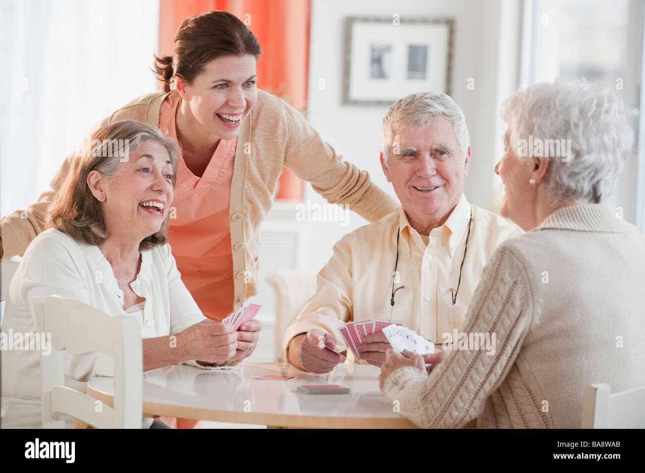 Adults playing cards hi-res stock photography and images - Alamy