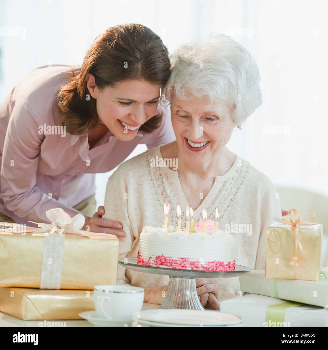 Senior woman celebrating birthday Stock Photo - Alamy